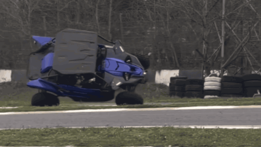 MotoGP star Toprak Razgatlioglu rides a Yamaha four-wheeler on two ...